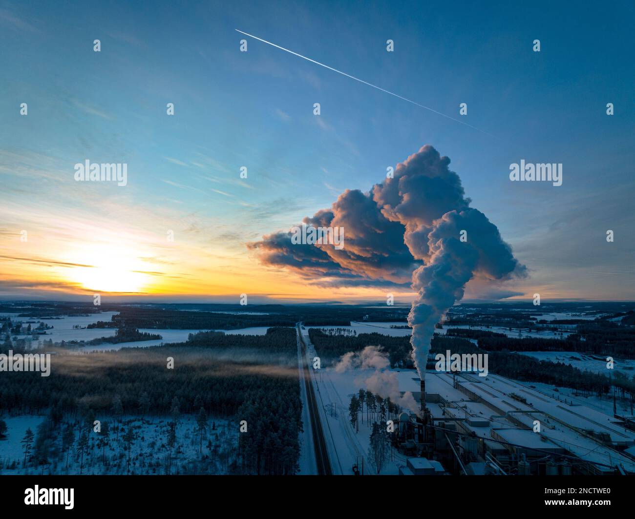 An aerial view of snow covered field with trees Stock Photo - Alamy