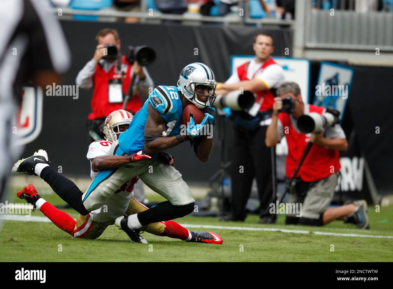 Carolina Panthers' David Gettis (12) catches a touchdown pass as San ...