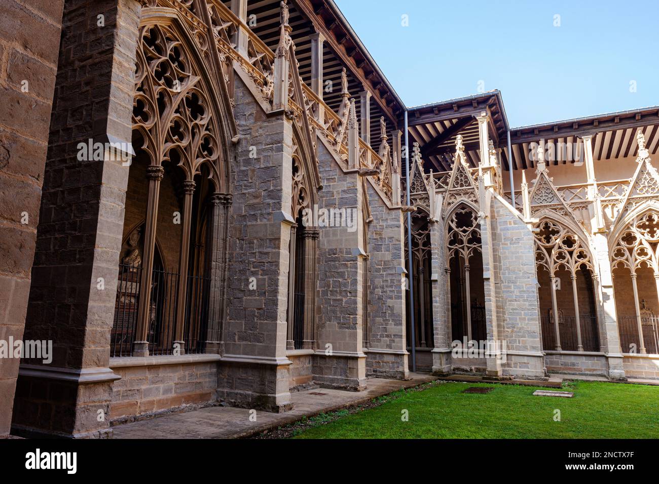 Ornate gothic cloister arcade arches of the Catholic Catedral de Santa ...