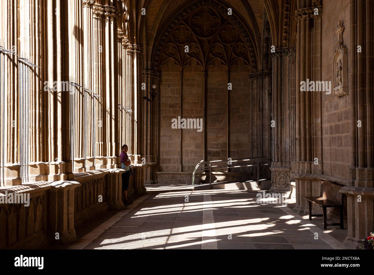 View of the ornate gothic cloister arcade arches of the Catholic ...