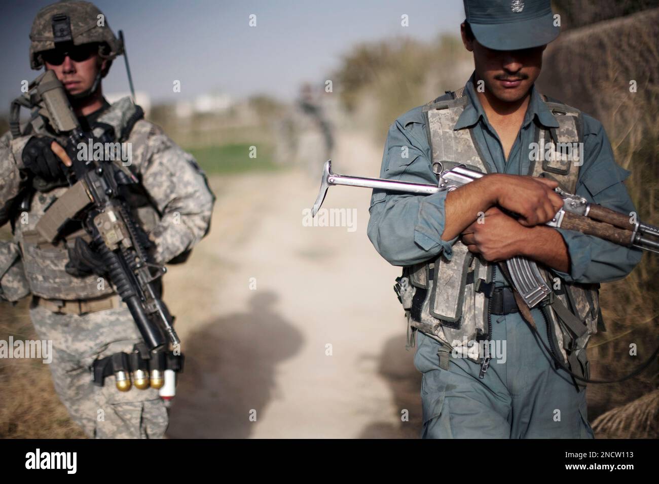 An Afghan policeman attached with US soldiers from 2nd PLT Diablos ...