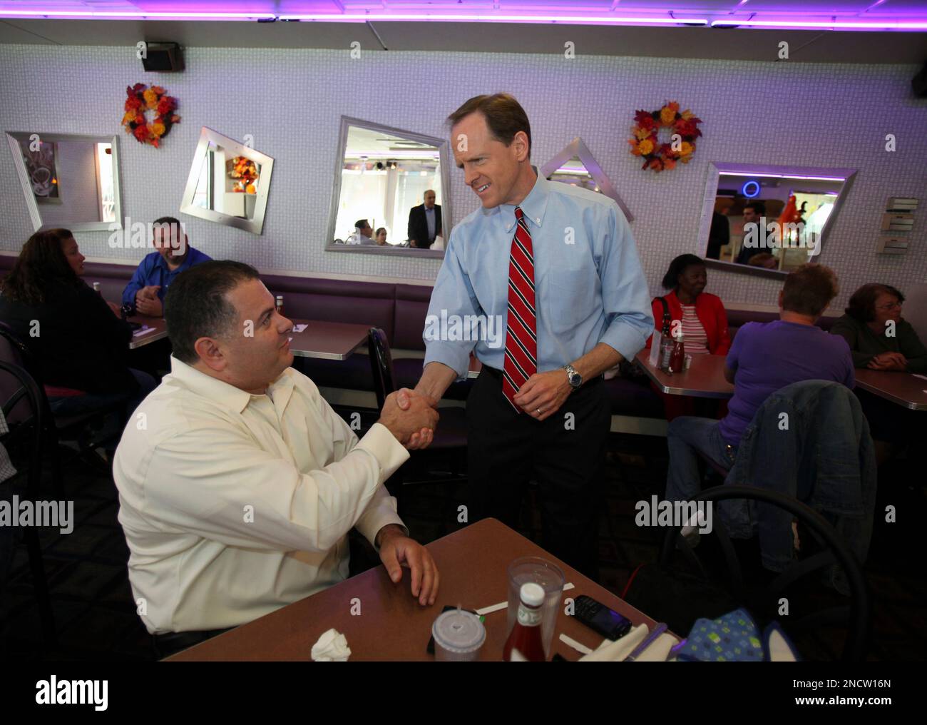 Republican Senate candidate Pat Toomey, right, shakes hands with Lou ...