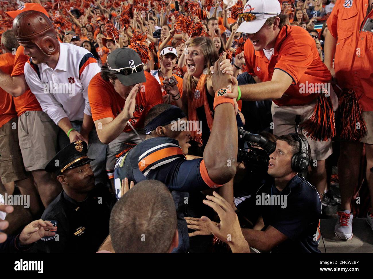 Auburn quarterback Cameron Newton celebrates a 24-17 win over LSU in ...