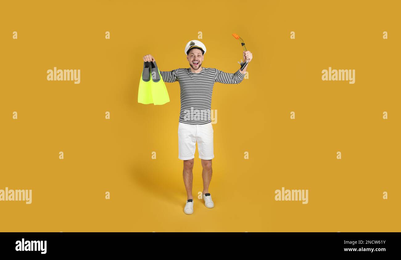 Excited sailor with swim fins and snorkel on white background Stock ...