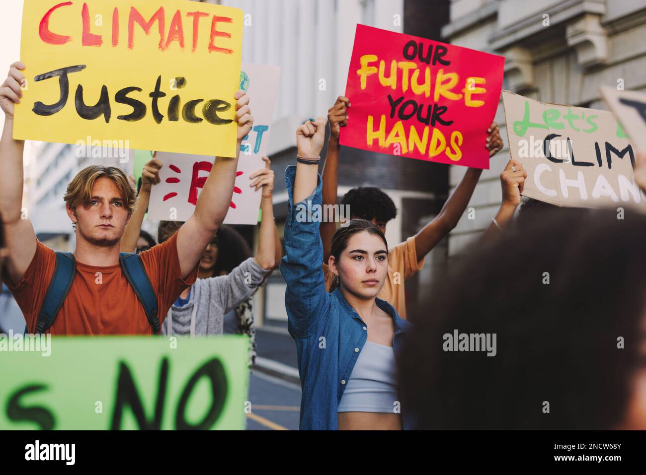 Young people marching against climate change and global warming ...