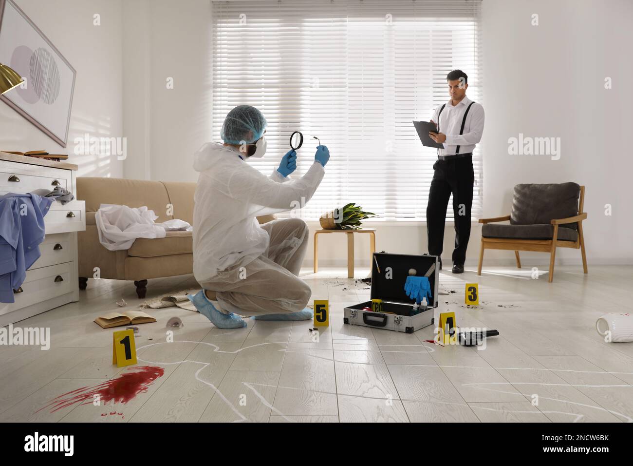 Detective working in incident room hi-res stock photography and images ...