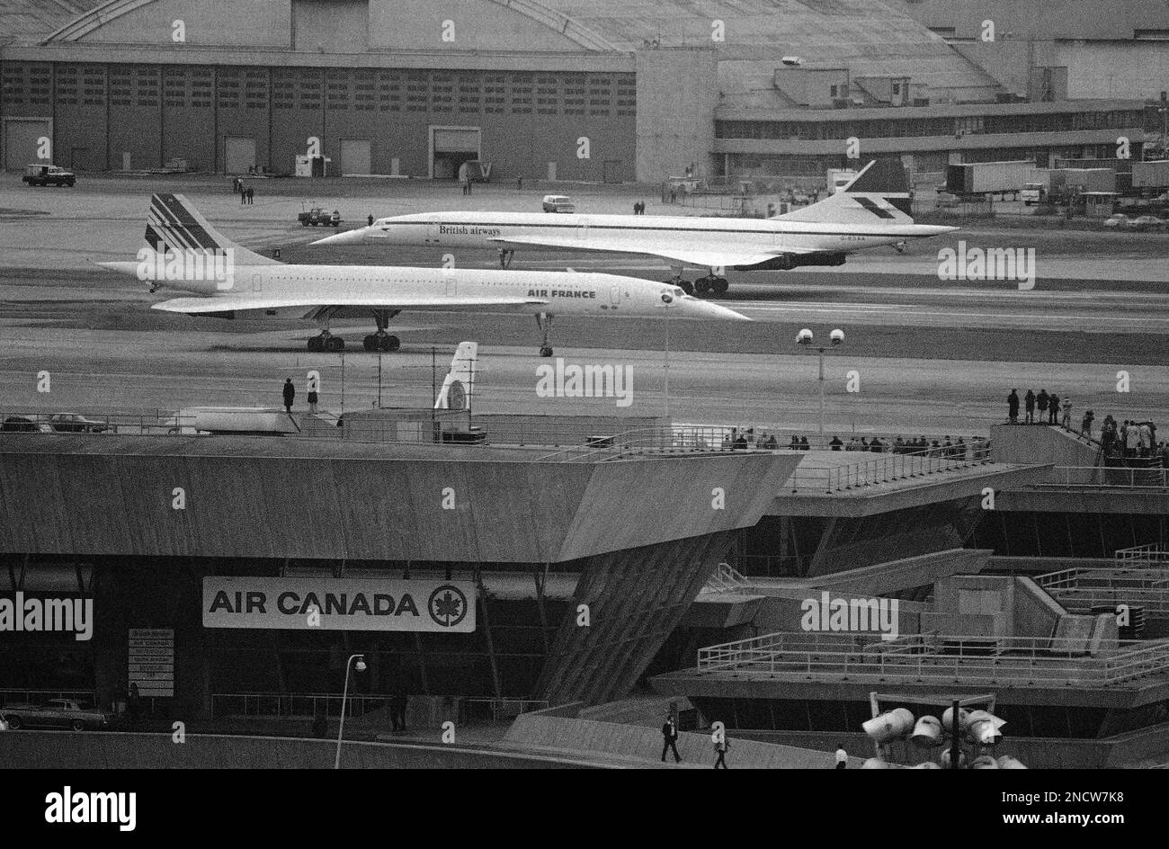 The British and French Concordes pass each other on the runway after ...
