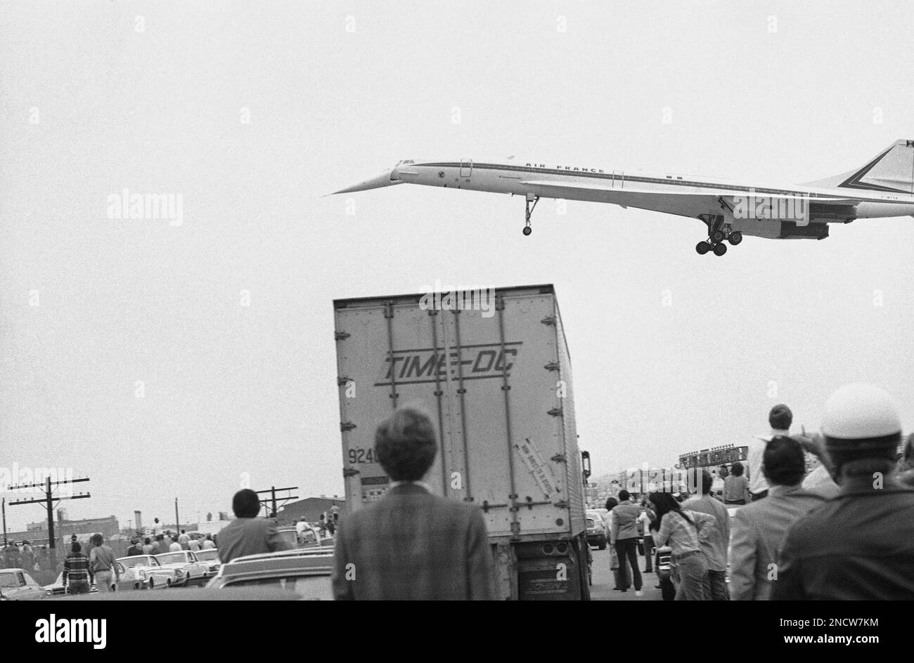 Motorists left their automobiles to watch the British-French Concorde ...