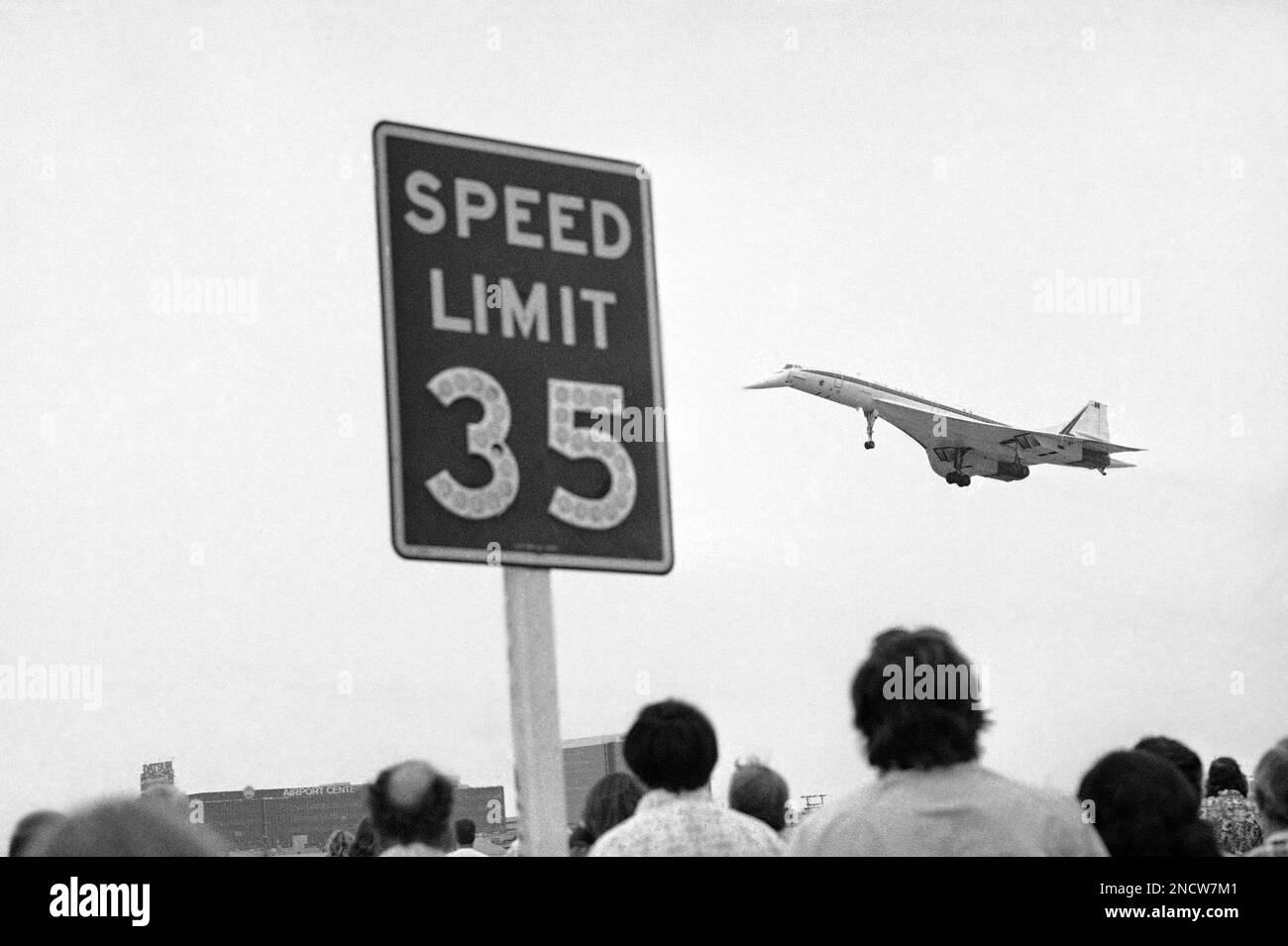 Motorists left their automobiles to watch the British-French Concorde ...