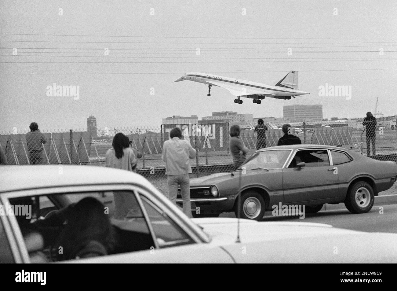 Motorists left their automobiles to watch the British-French Concorde ...