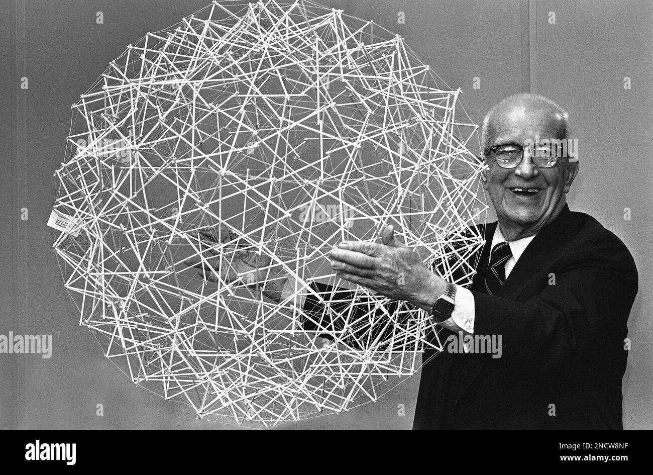 Inventor R. Buckminster Fuller holds up a “Tensegrity” sphere in ...