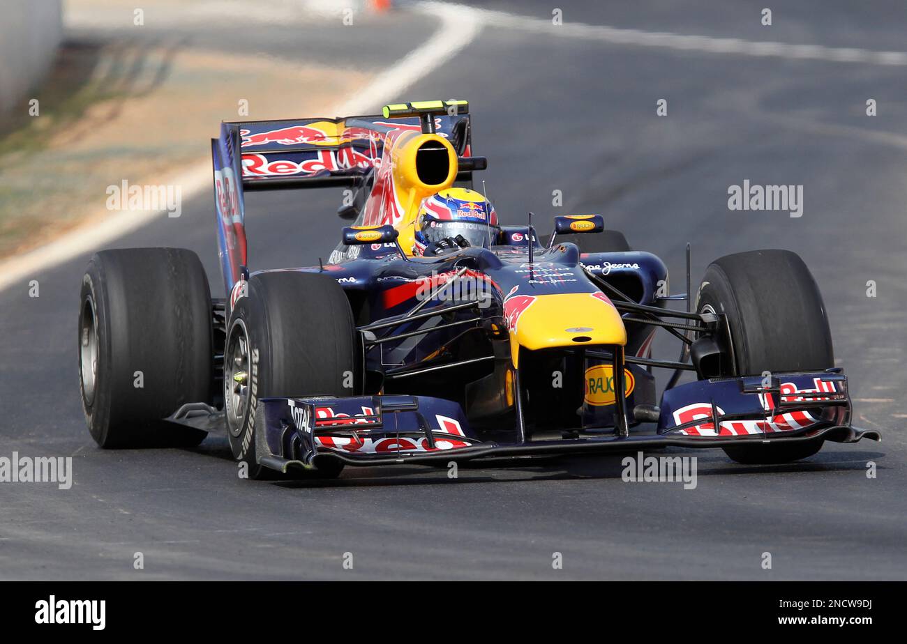 Red Bull Formula One driver Mark Webber of Australia drives during the ...