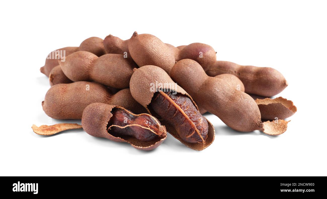 Delicious ripe tamarinds on white background. Exotic fruit Stock Photo ...