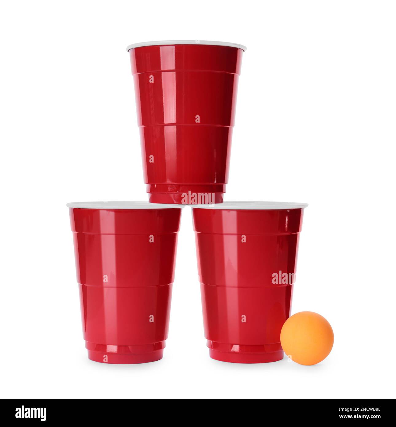 Red plastic cups and ball for beer pong on white background Stock Photo ...