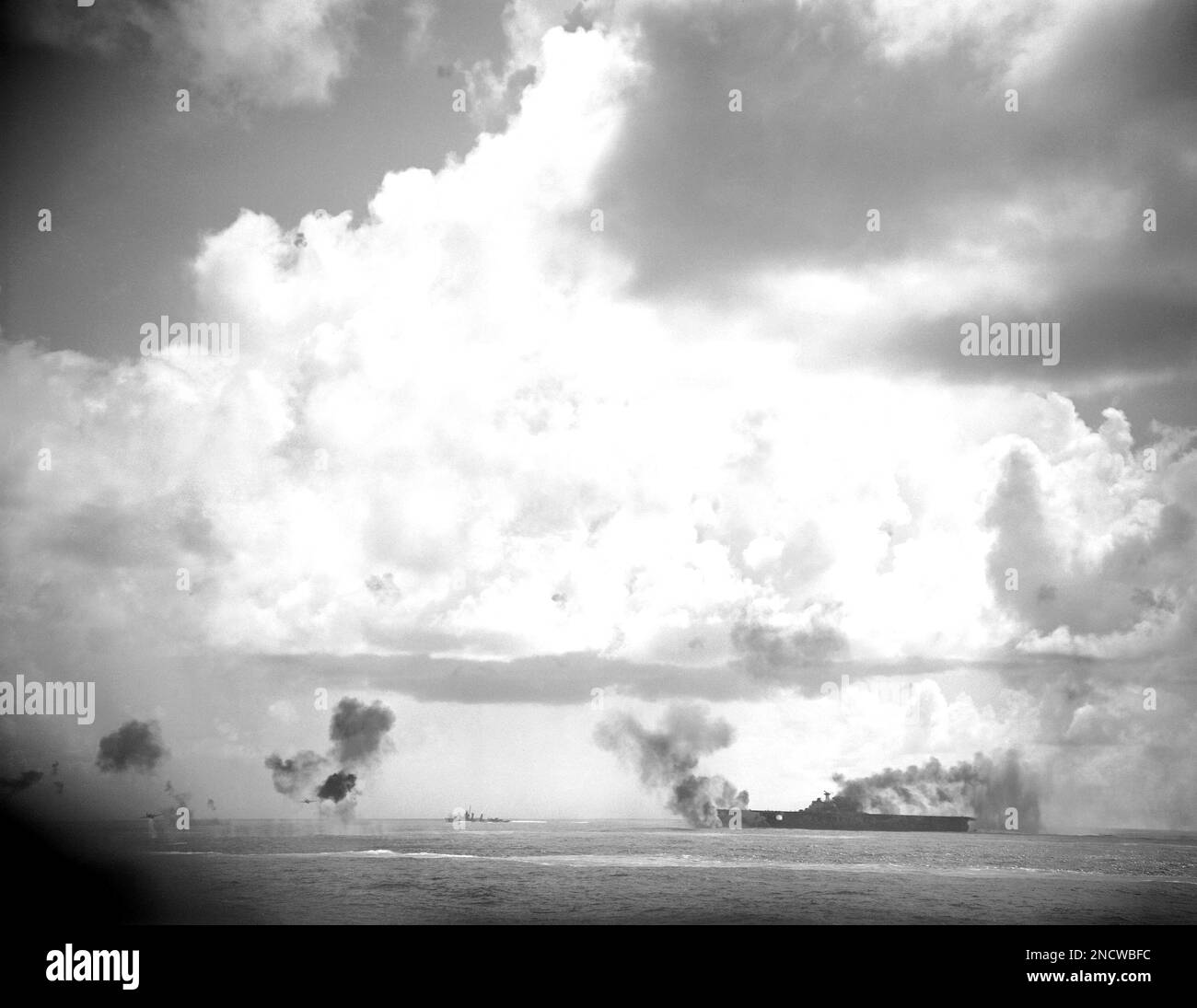 Japanese torpedo planes and bombing craft attack the U.S.S. Hornet ...