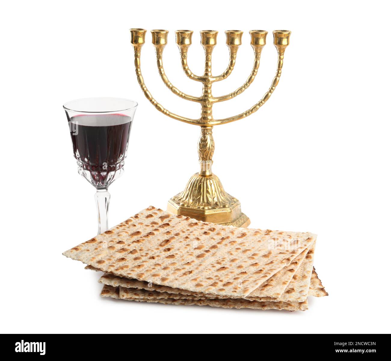 Traditional matzos, red wine and menorah on white background Stock ...