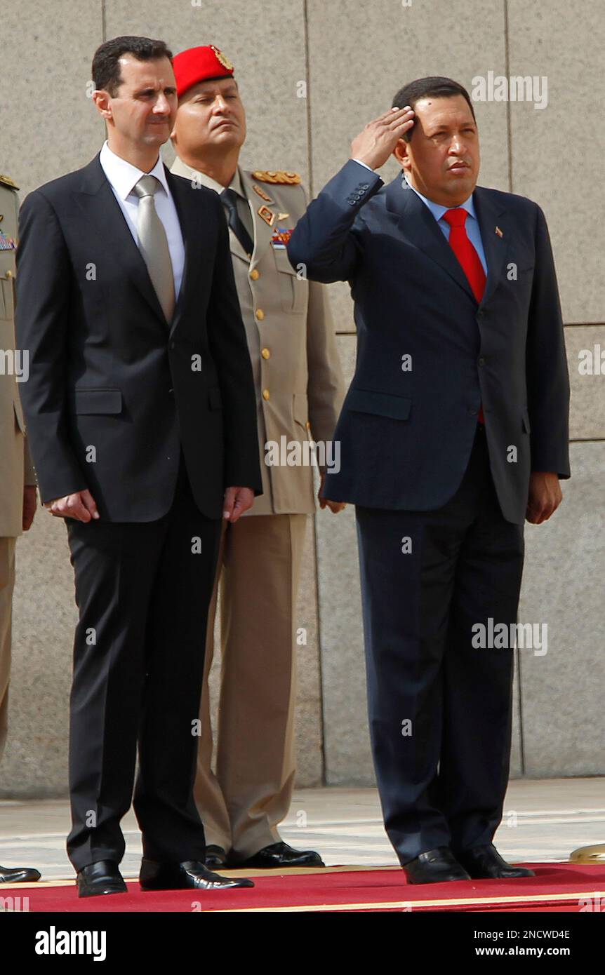 Venezuelan President Hugo Chavez, right, and Syrian President Bashar ...