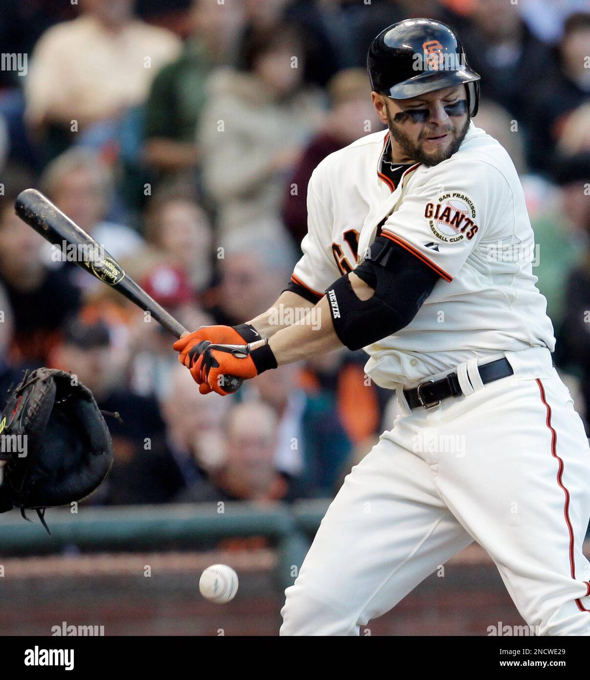 San Francisco Giants' Cody Ross is hit by a pitch during the second ...
