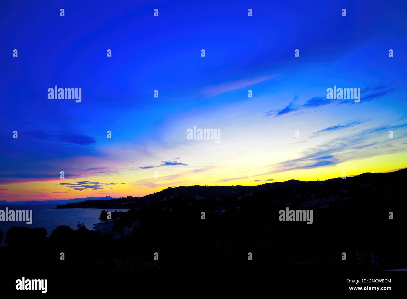 great sunset , blue hour. Skiathos island, Greece Stock Photo - Alamy