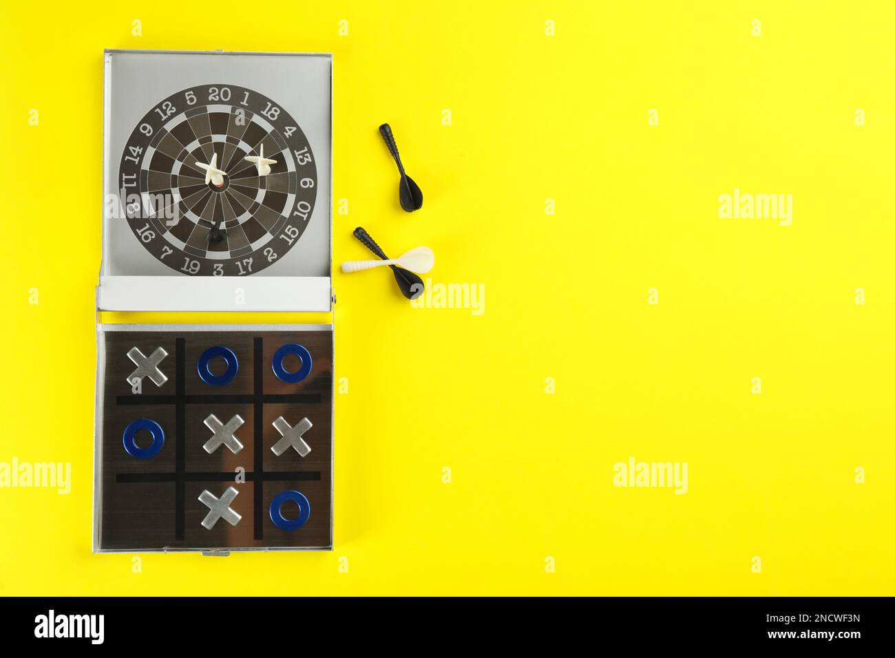 Board games on yellow background, flat lay. Space for text Stock Photo ...