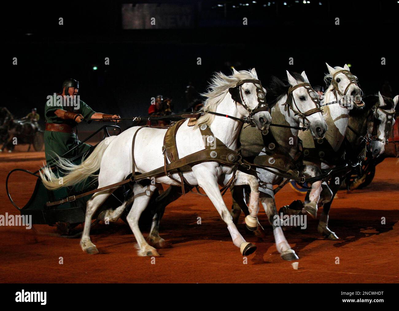 Chariots race around Sydney Olympic Stadium during a full dress ...