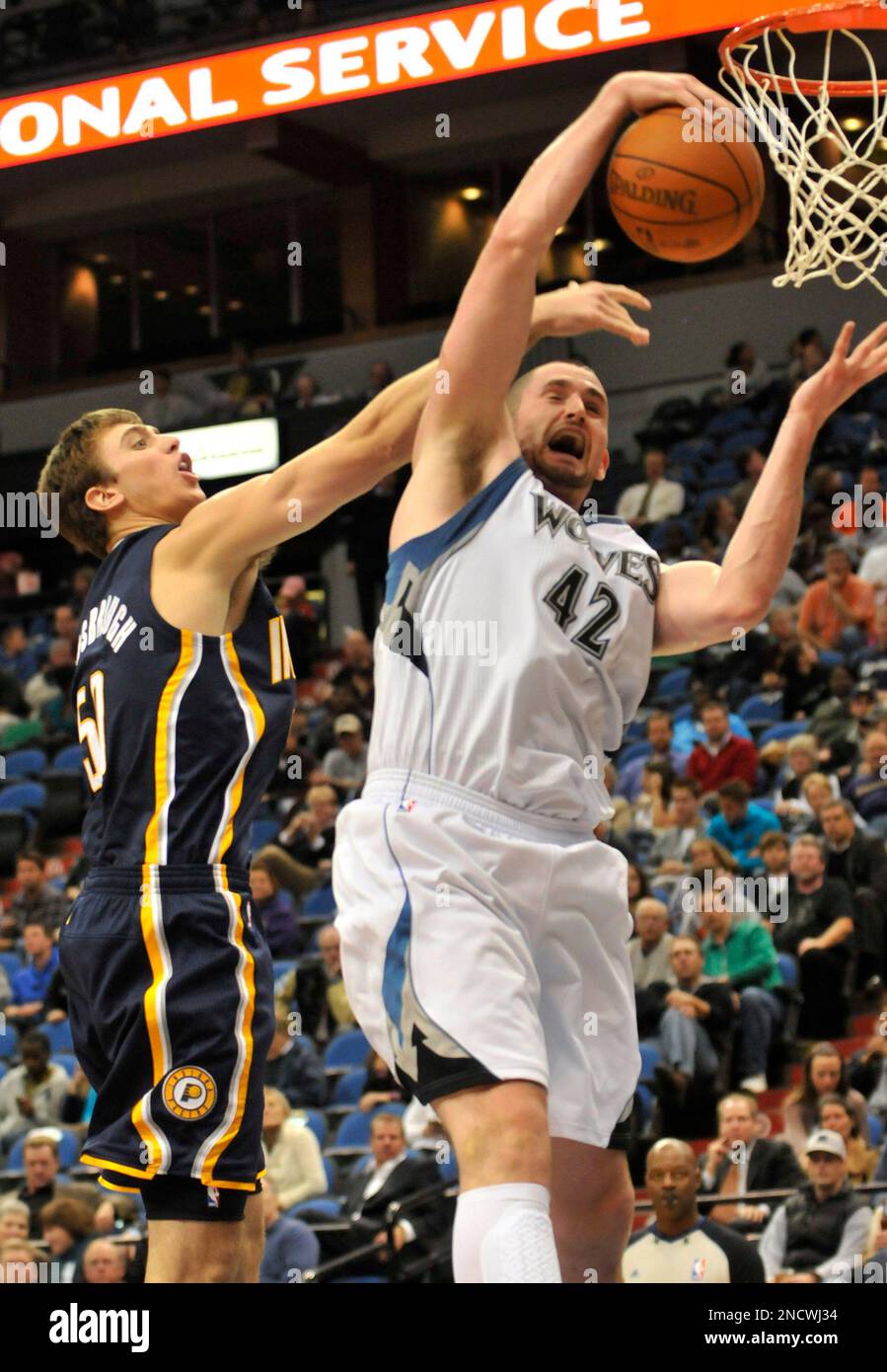Minnesota Timberwolves' Kevin Love (42) beats Indiana Pacers' Tyler ...