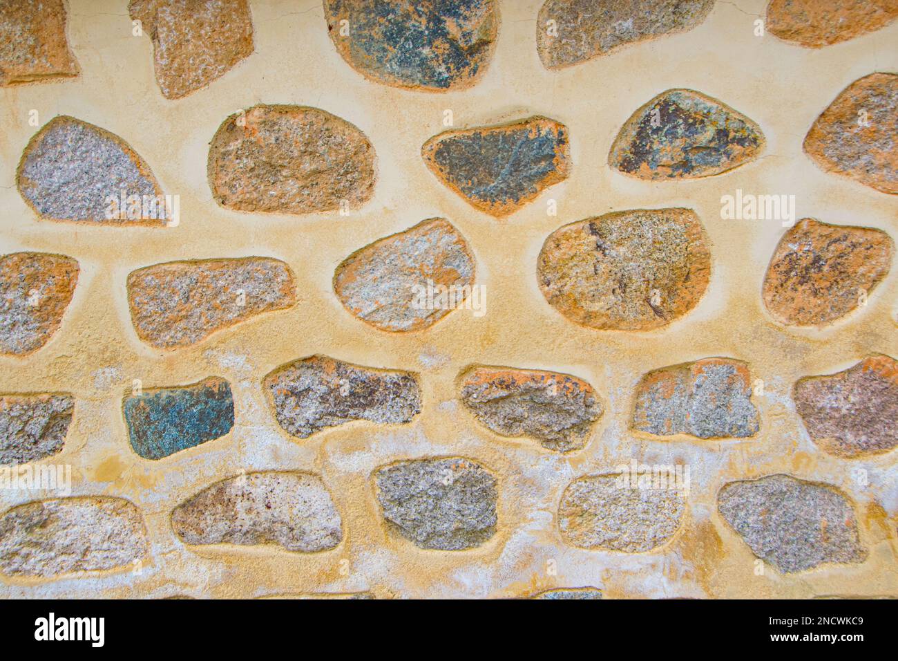 Stone wall as a background or texture. An example of masonry as a ...