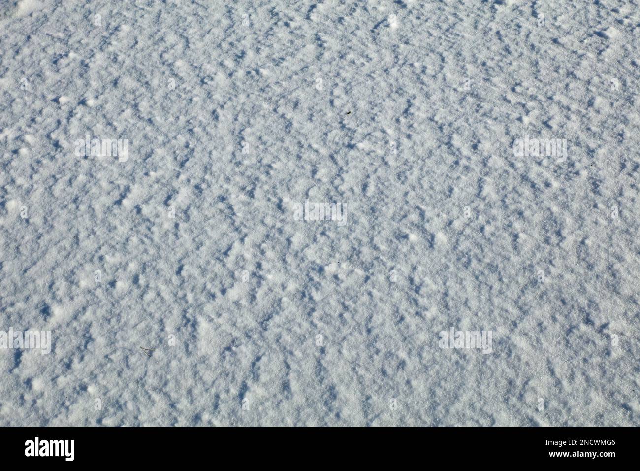 Lake ice covered with snow in winter Stock Photo - Alamy