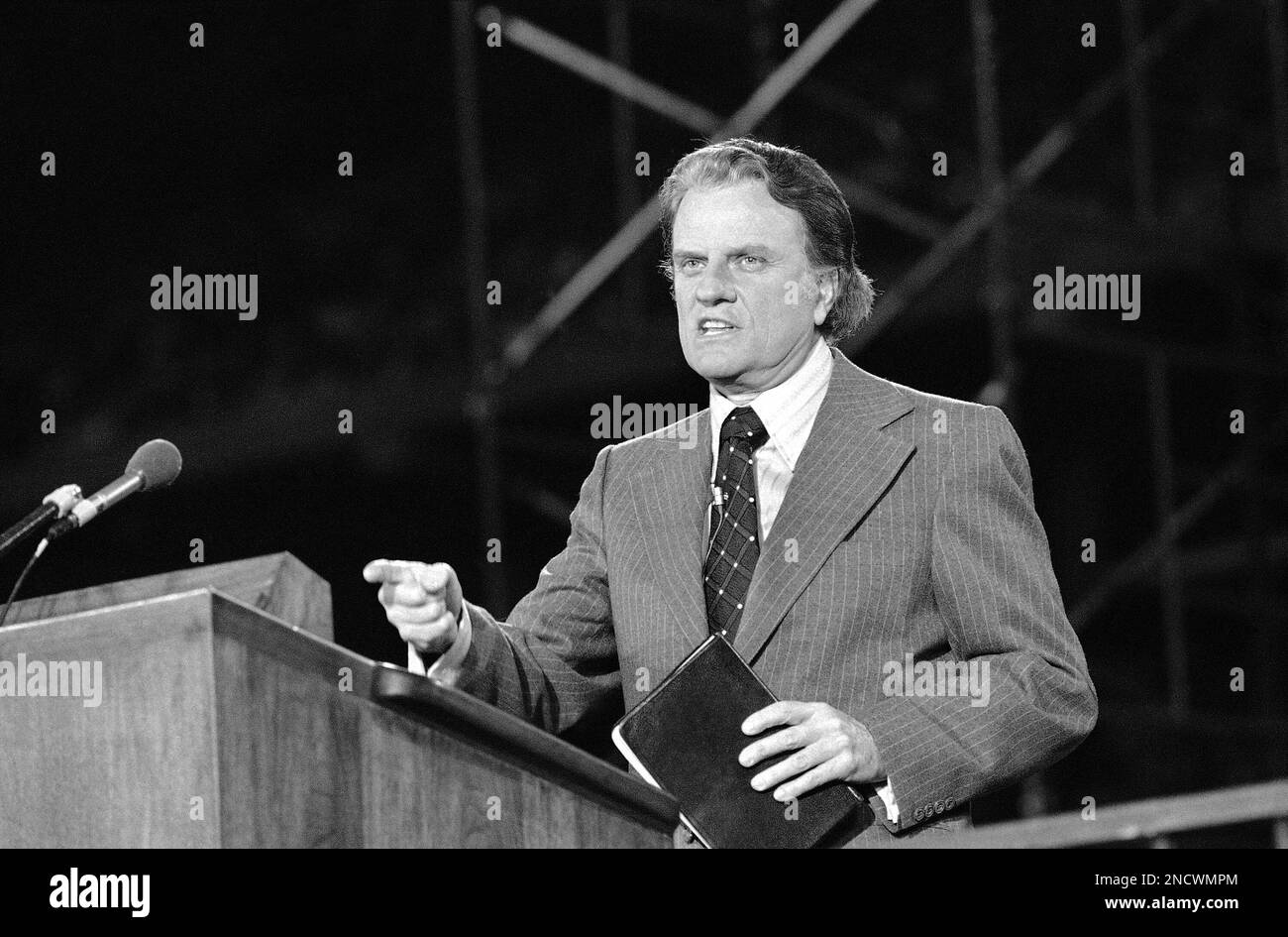 Communication looking away standing microphone gesturing hi-res stock ...