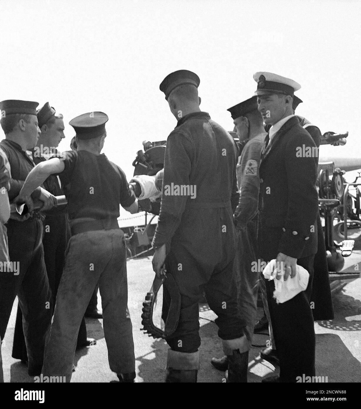 British sailors fire American guns, and clean ‘EM up for action against ...