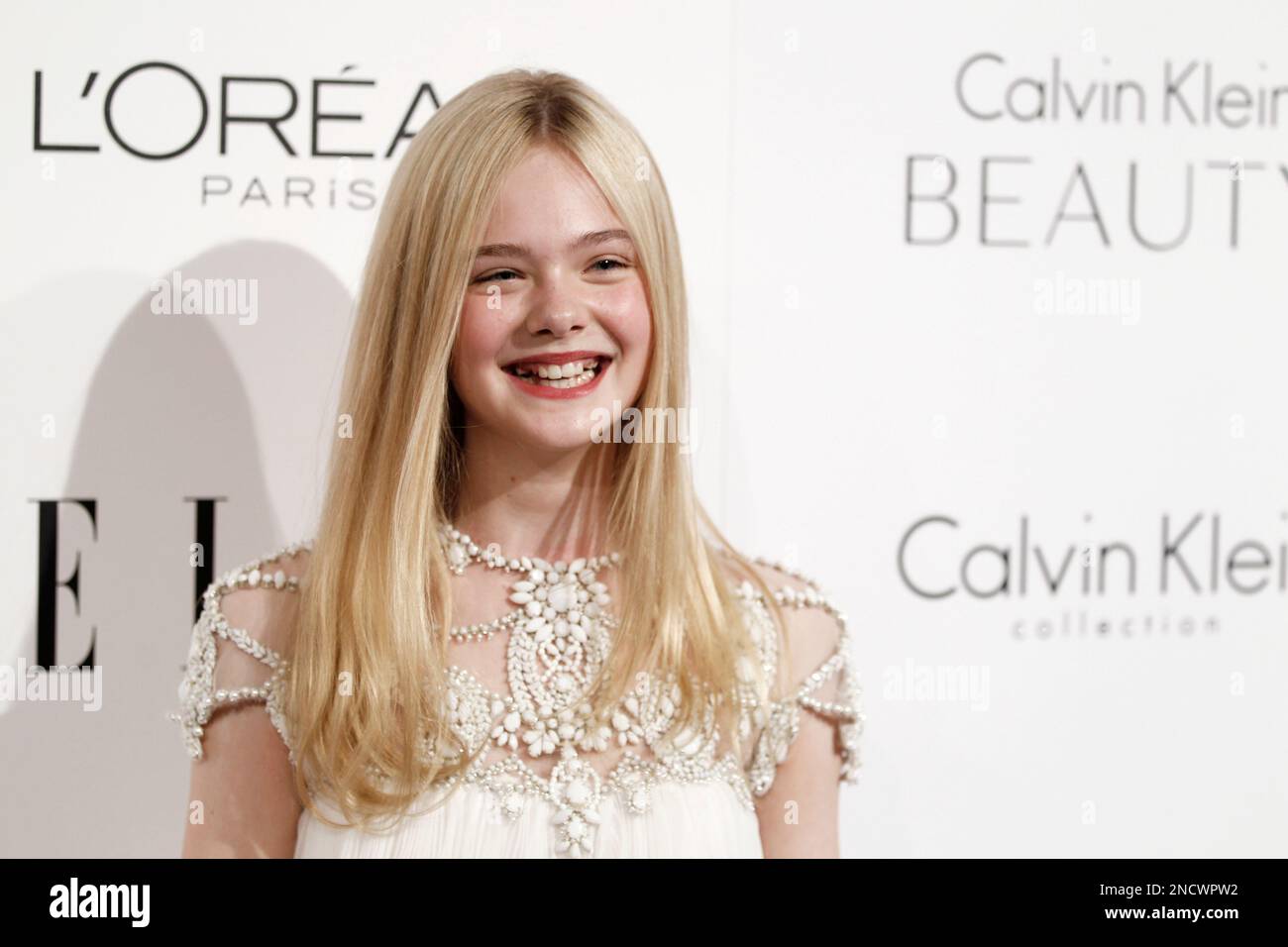 Actress Elle Fanning arrives at a ELLE magazine's 17th Annual Women in ...