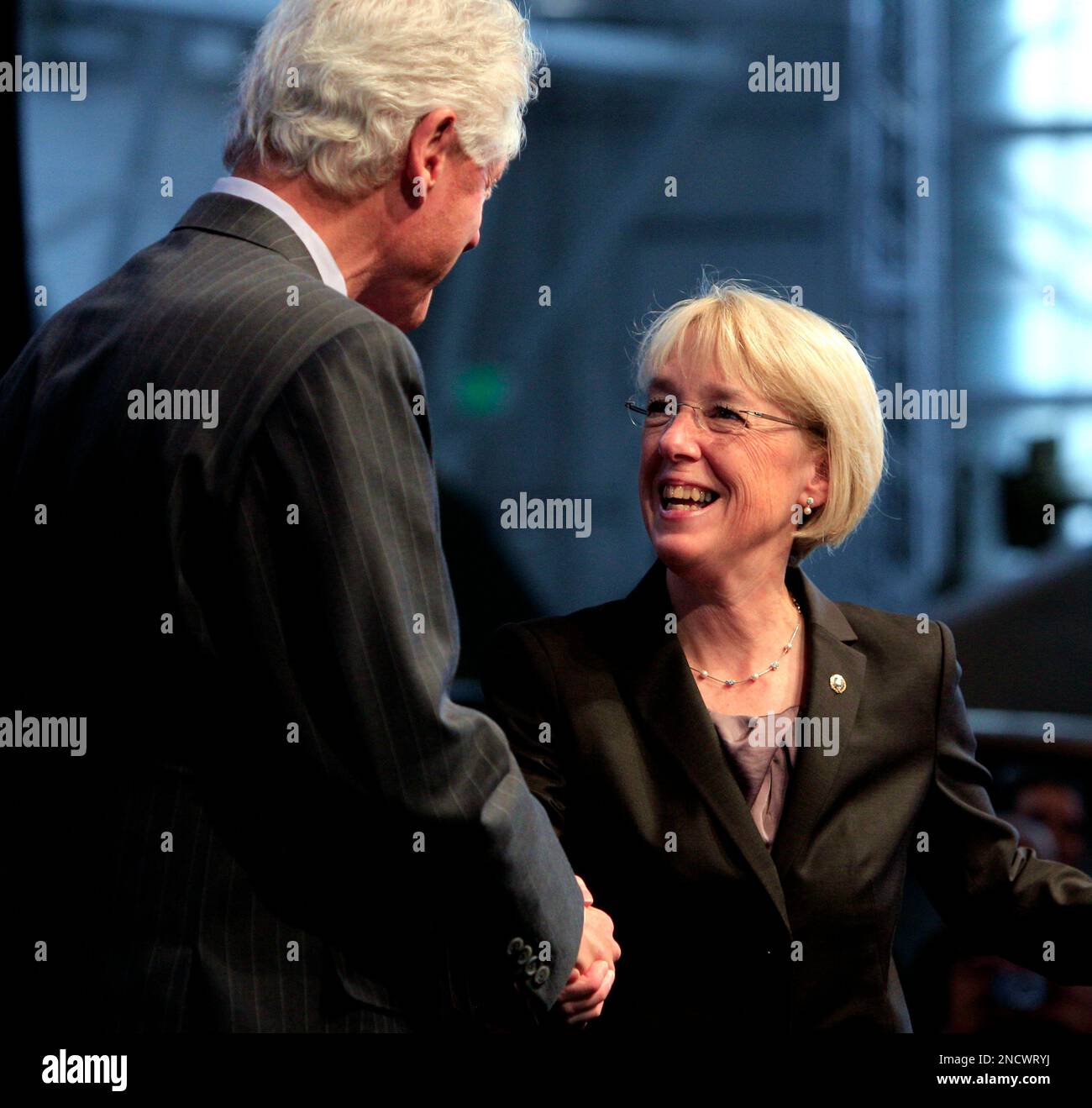 Former President Bill Clinton, left, greets Sen. Patty Murray as he is ...