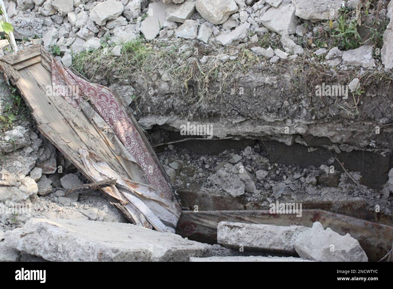 A grave is seen in the St. Joseph cemetery, in Addis Ababa, Ethiopia's ...
