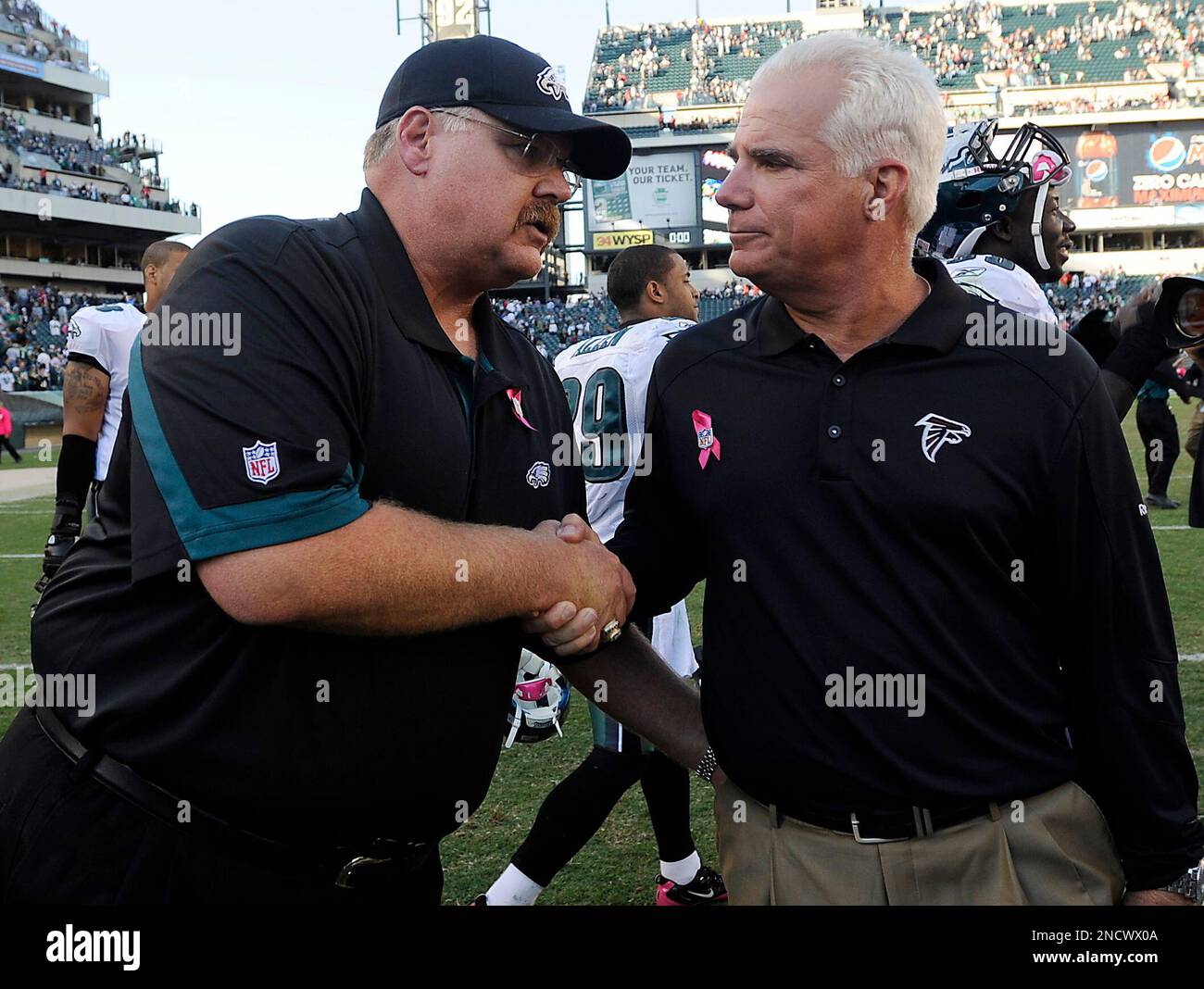 Philadelphia Eagles coach Andy Reid and Atlanta Falcons coach Mike ...