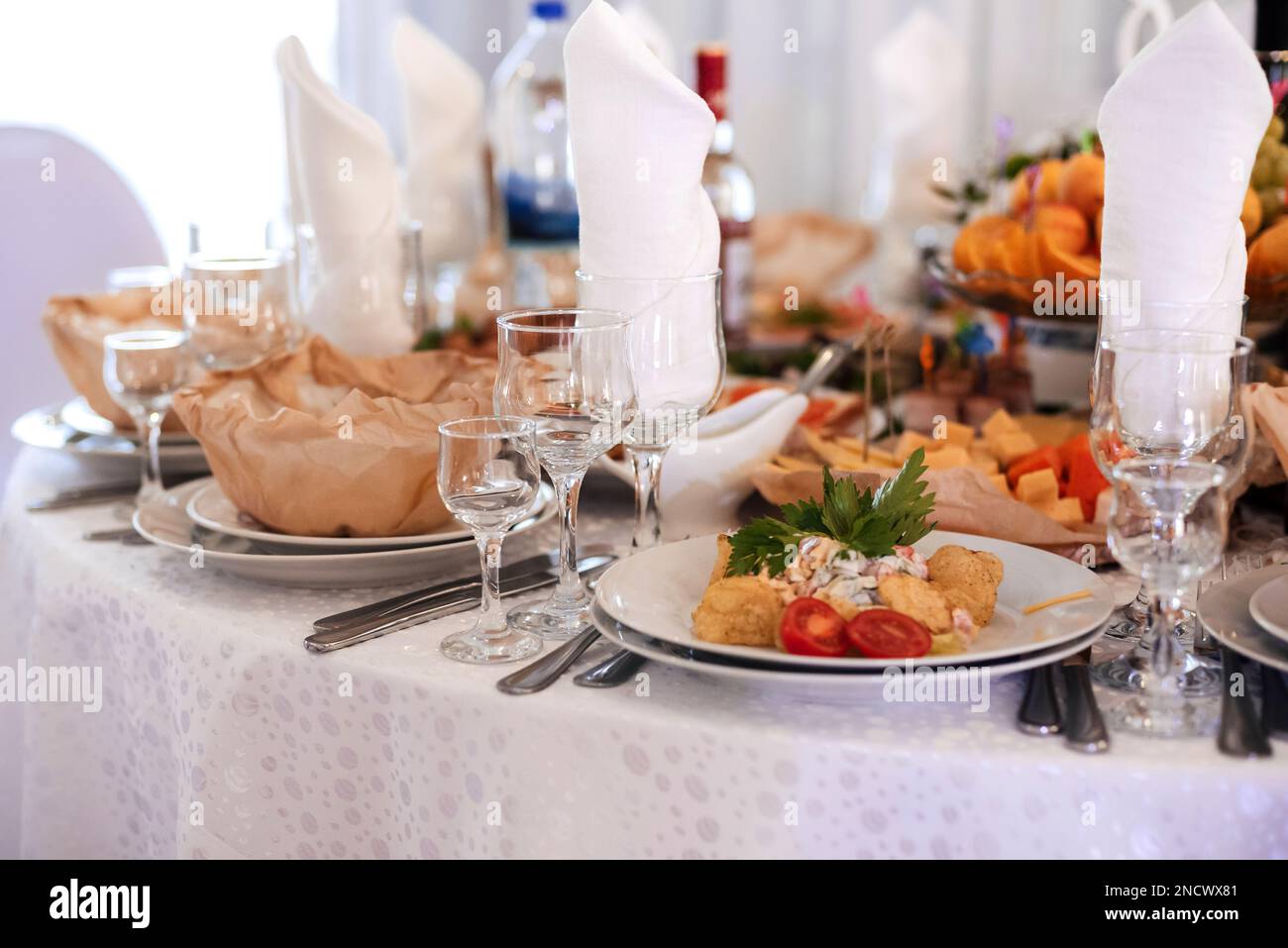 table set with light snacks, canapes glasses Stock Photo - Alamy