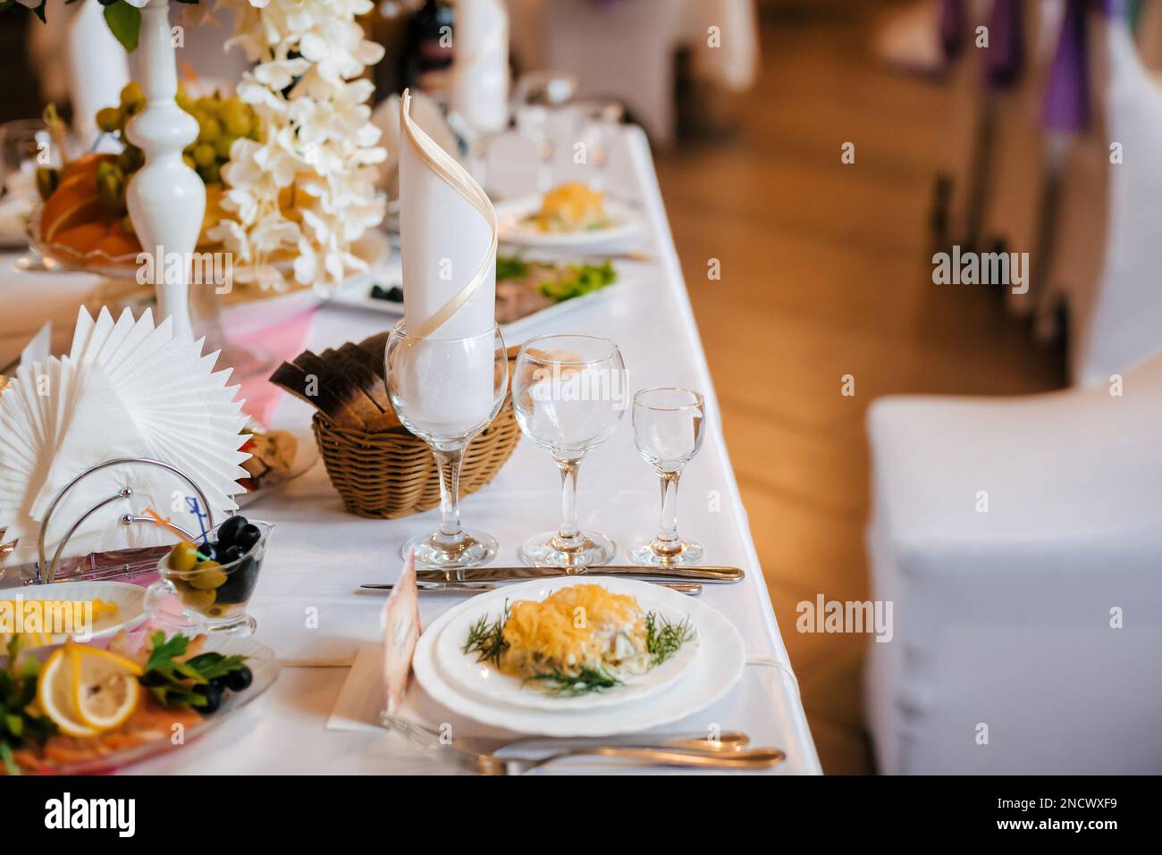 table is served for the celebration with snacks and alcohol Stock Photo ...