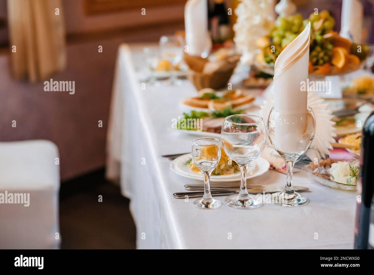 table is served for the celebration with snacks and alcohol Stock Photo ...