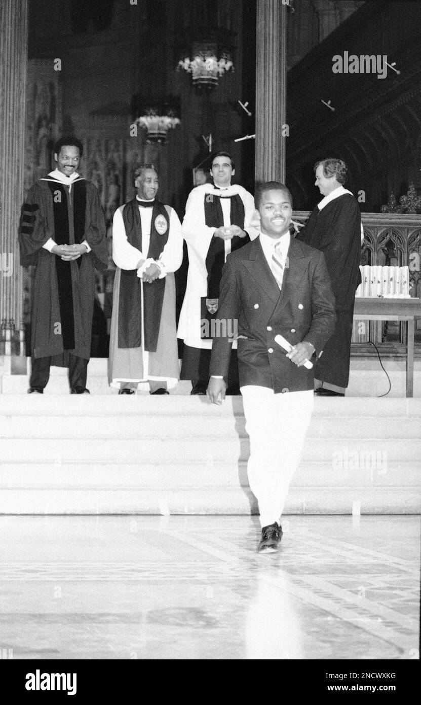 Democratic presidential candidate Jesse Jackson, left, watches his son ...
