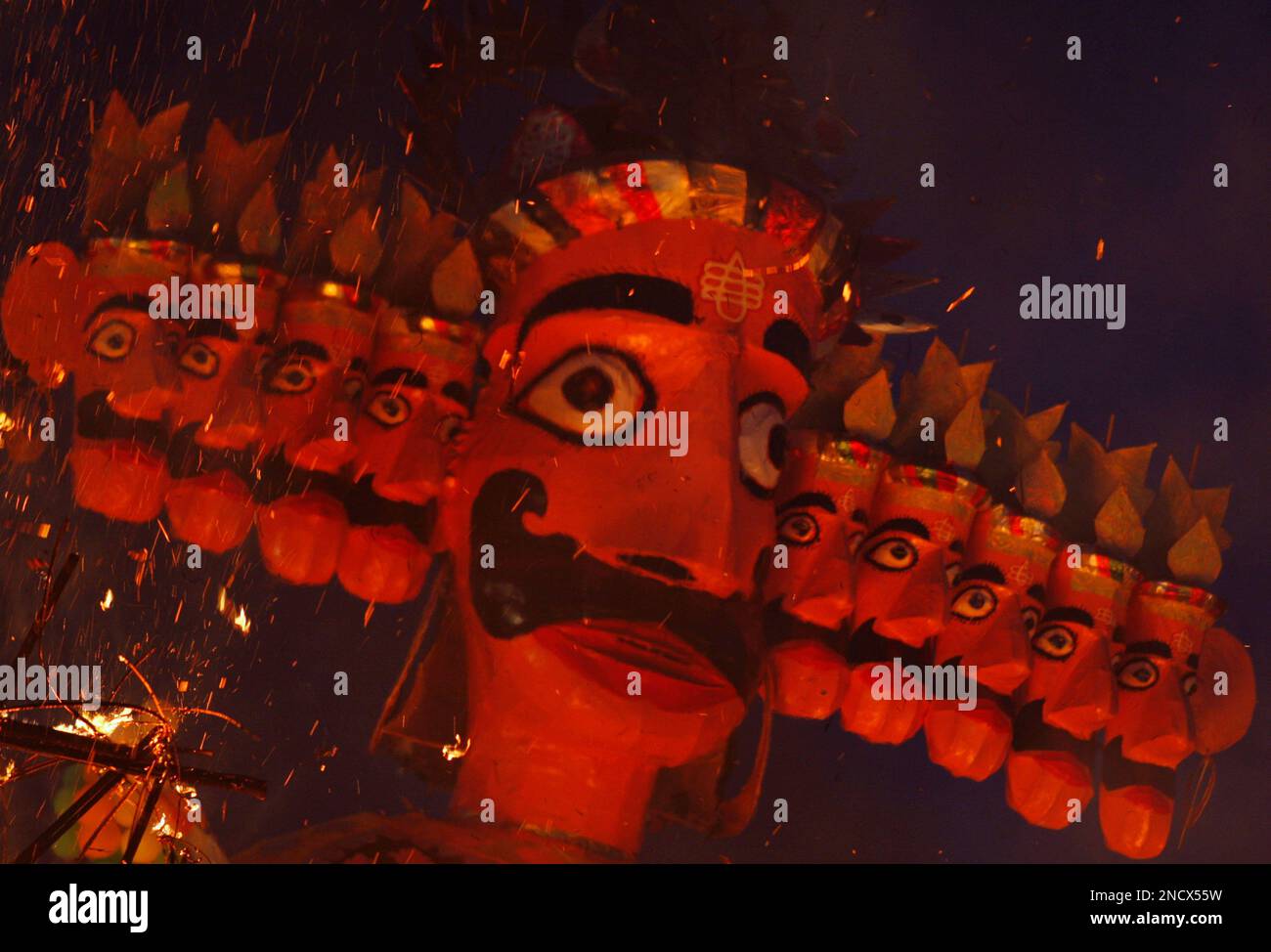 An effigy of demon King Ravana is burned on the occasion of Dussehra in ...