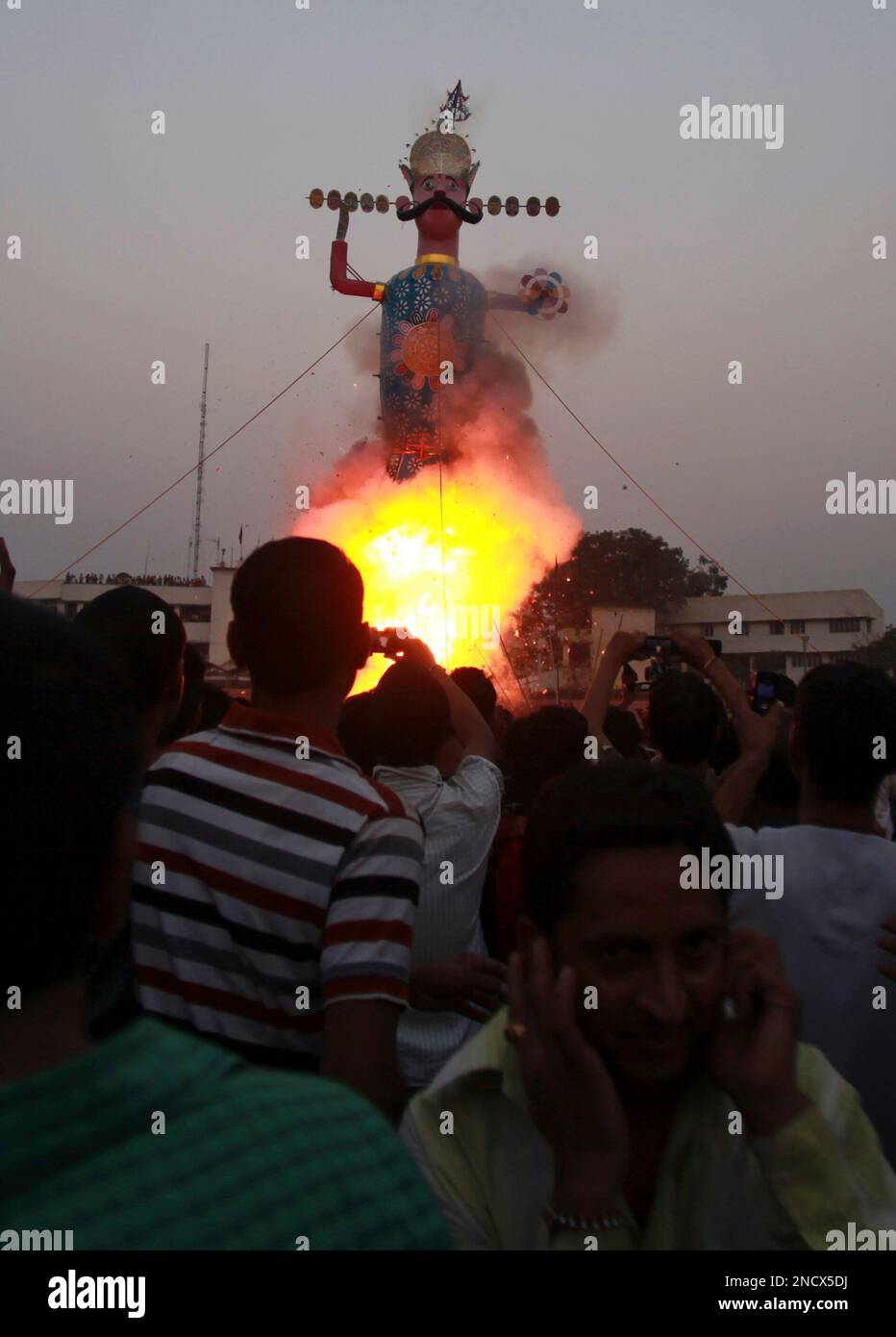 An effigy of demon King Ravana is burned on the occasion of Dussehra in ...