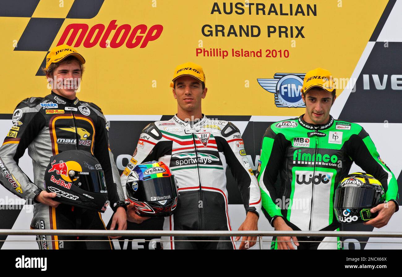 Alex De Angelis of San Marino, center, Scott Redding of Britain, left ...