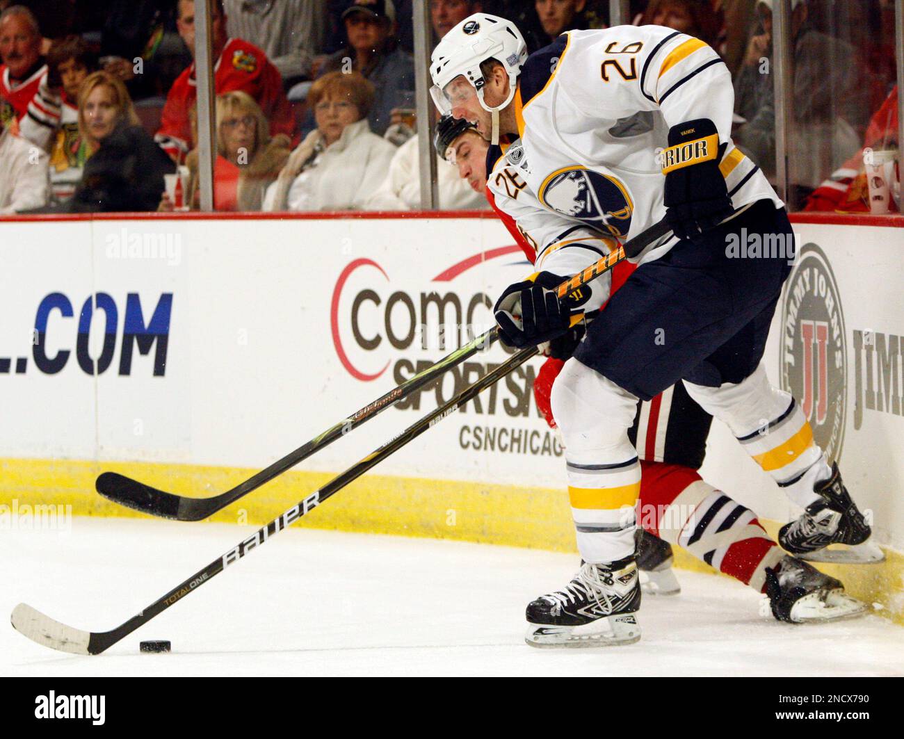 Buffalo Sabres' Thomas Vanek (26) battles for the puck with Chicago ...