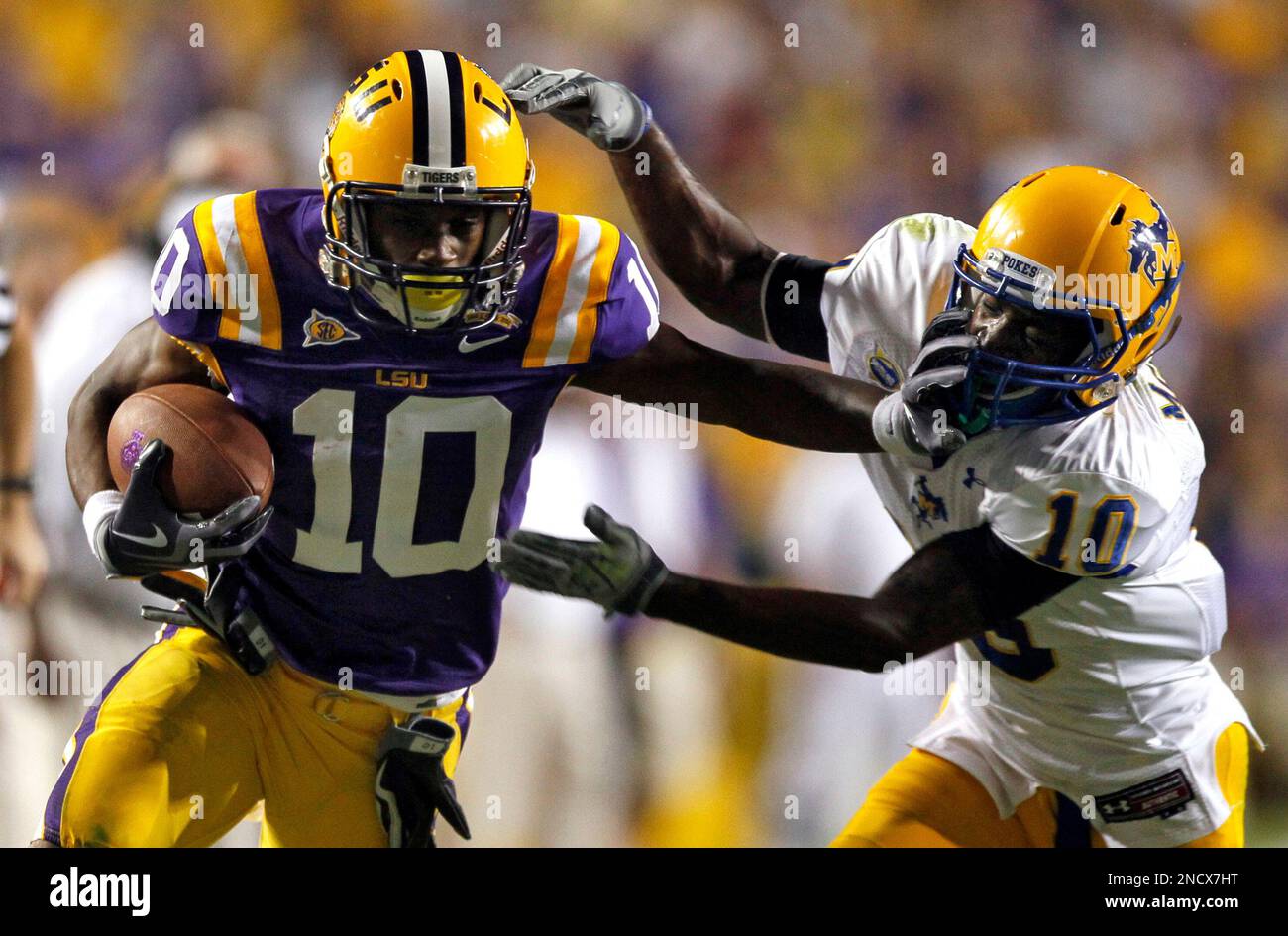 LSU wide receiver Russell Shepard holds back McNeese State cornerback ...