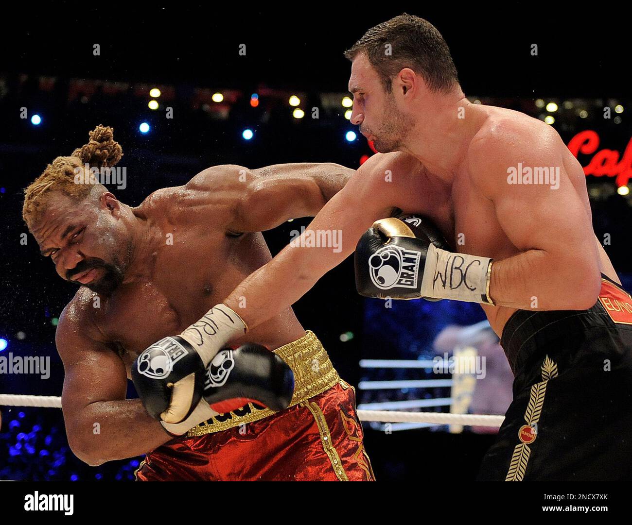 WBC world champion Ukrainian Vitali Klitschko, right, and challenger ...