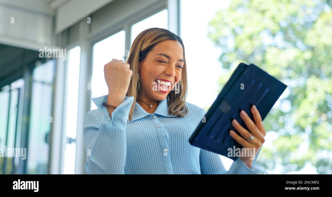 Business woman, tablet and walking in victory for good news, promotion ...