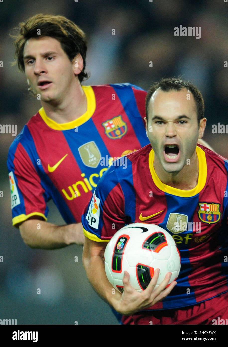FC Barcelona's Andres Iniesta reacts after scoring with his teammate ...