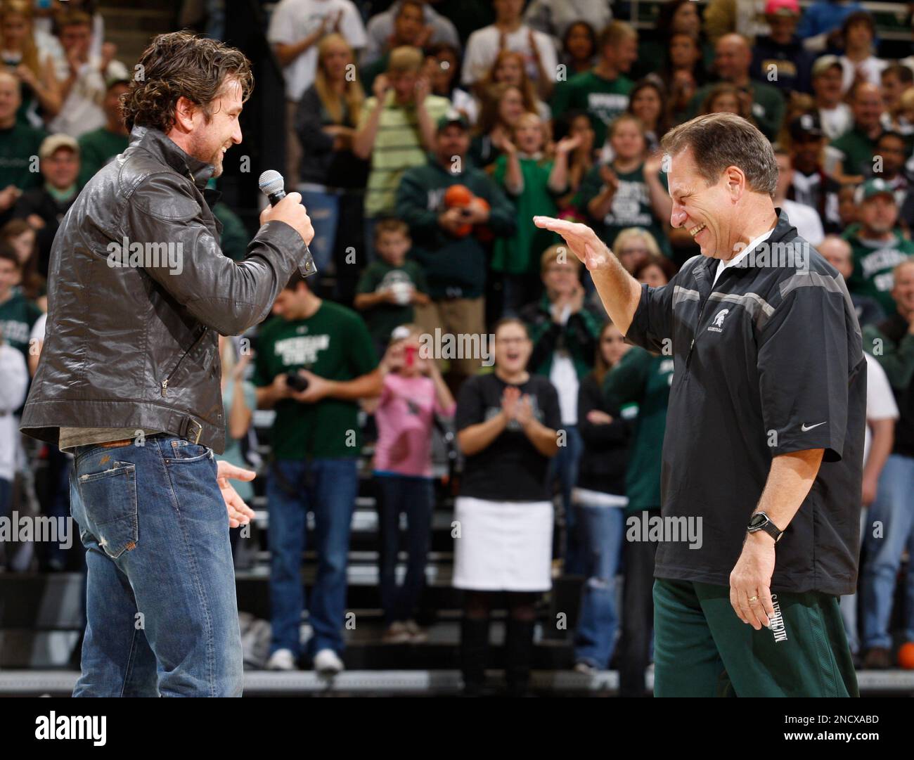 Actor Gerard Butler, left, of the movie "300," and Michigan State coach ...