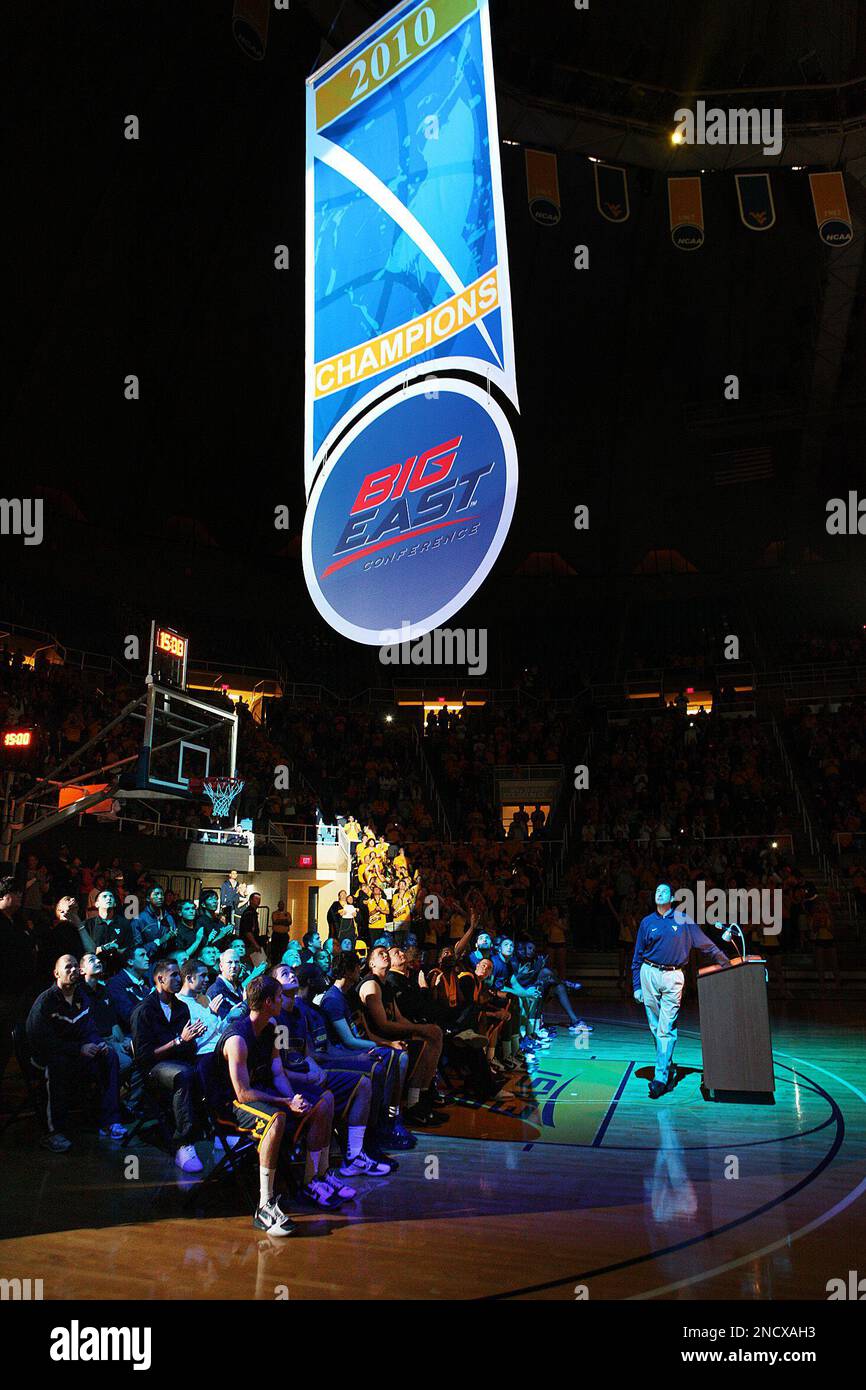 West Virginia men's basketball team looks on as the 2010 Big East ...