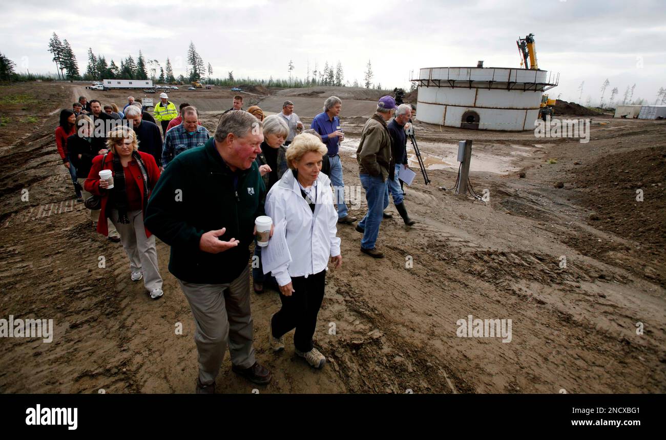 Rep. Norm Dicks, left front, and Gov. Chris Gregoire lead a tour of a ...
