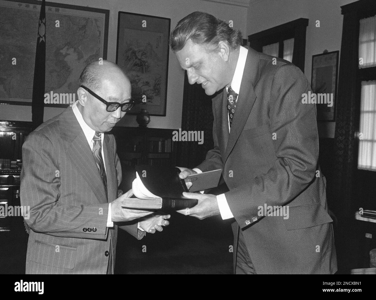 Billy Graham presents to Nationalist Chinese President Yen Chia Kan in ...